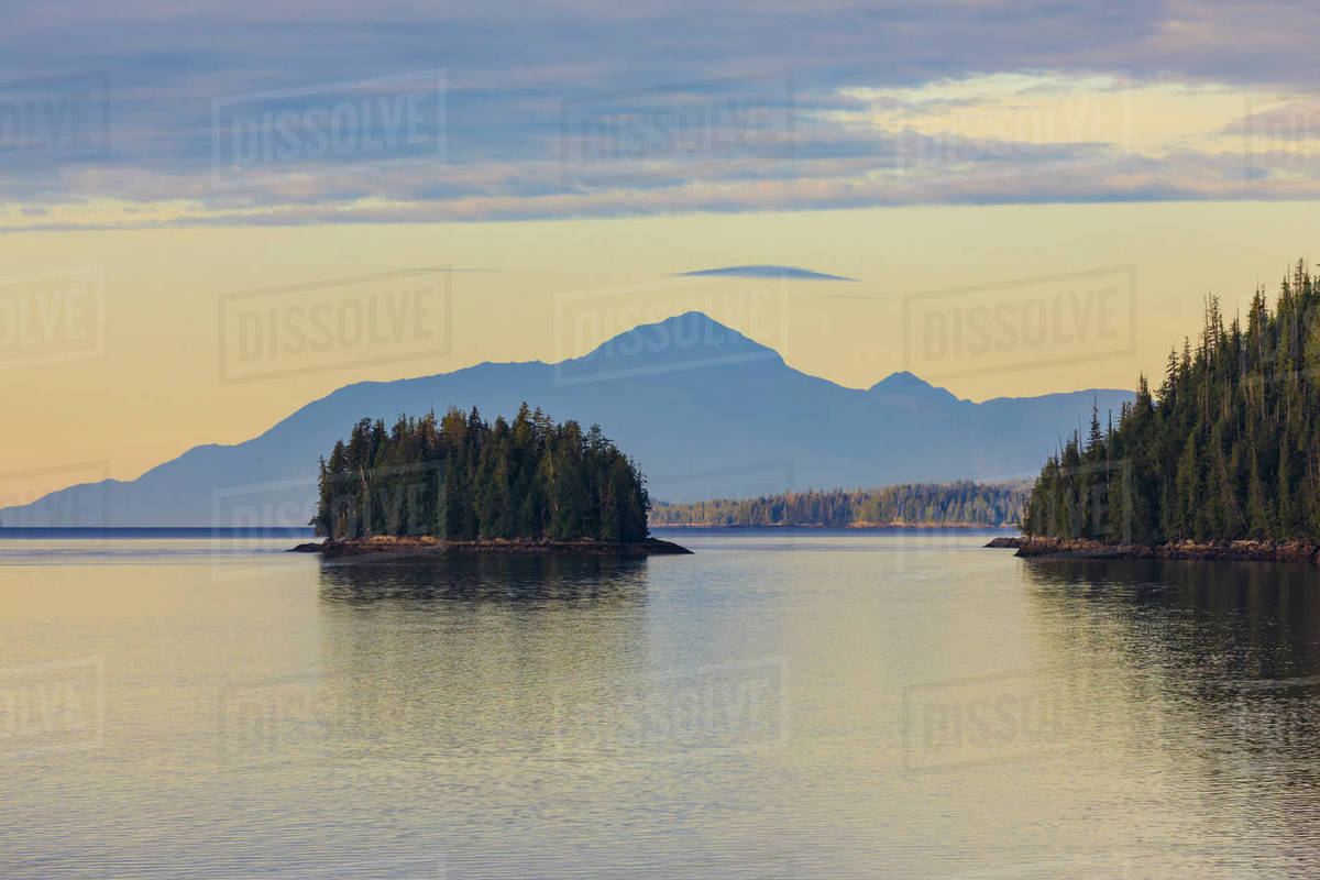 Sunrise, entering the Misty Fjords National Monument, islands, forest ...