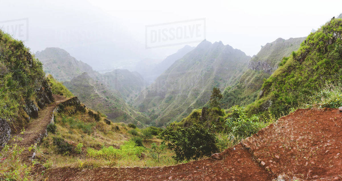 Panoramic view of the fertile ravine valley with volcanic mountain ...