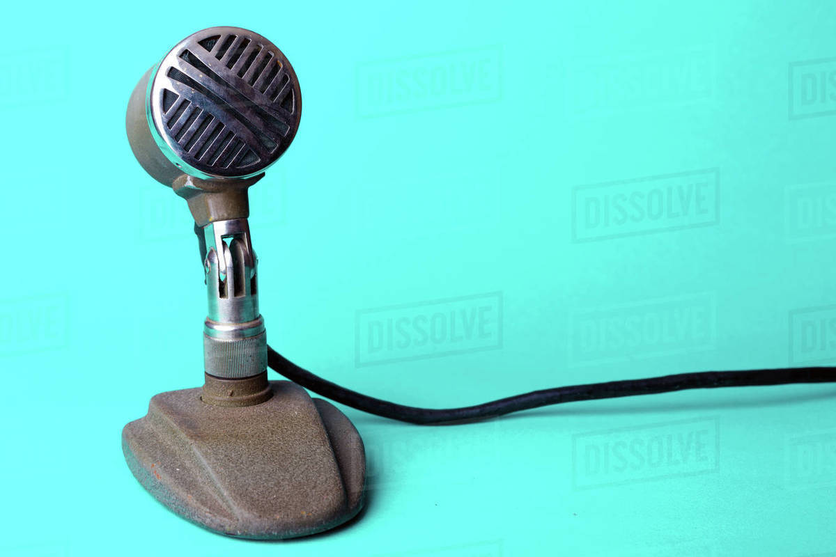 Retro stylish microphone on a blue background - Stock Photo - Dissolve