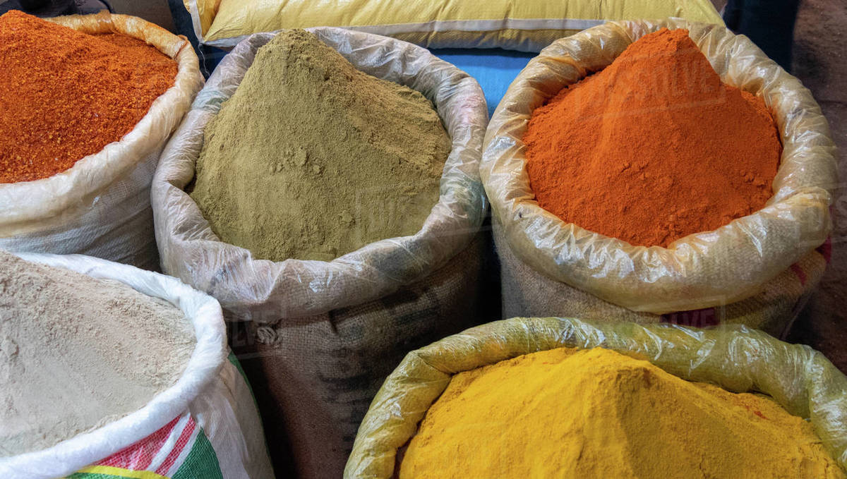 large bags of ground spices at the spice market of chandni chowk in old ...