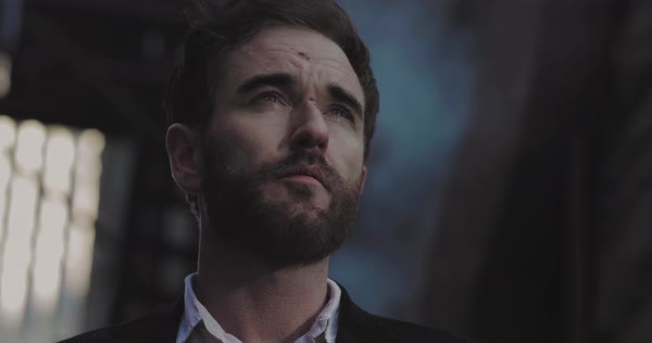 Close-up shot of a man crying while standing outdoors, Calgary, Alberta ...