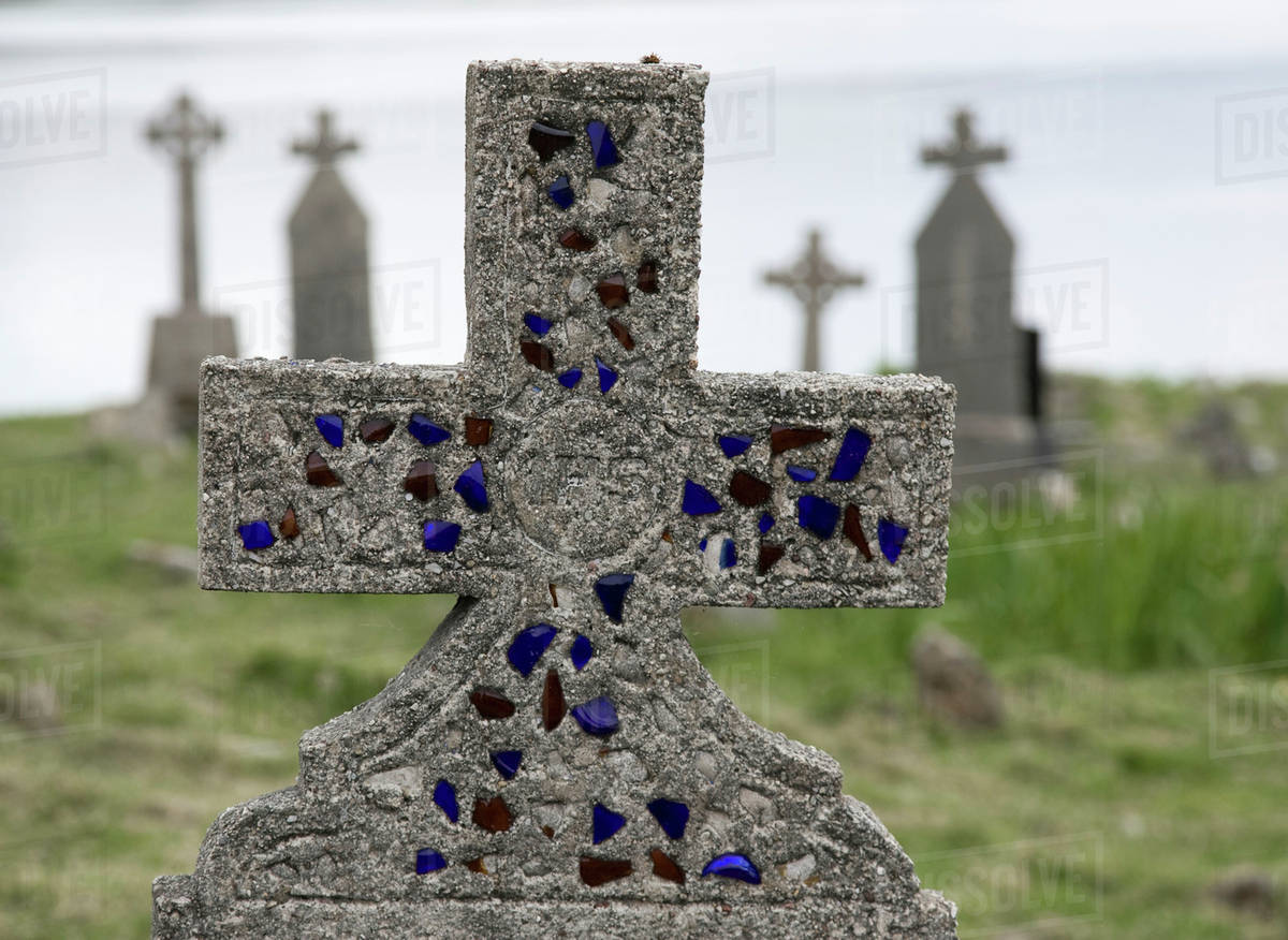 Ireland, County Mayo, Achill Island. Decorative gravestone crosses at ...