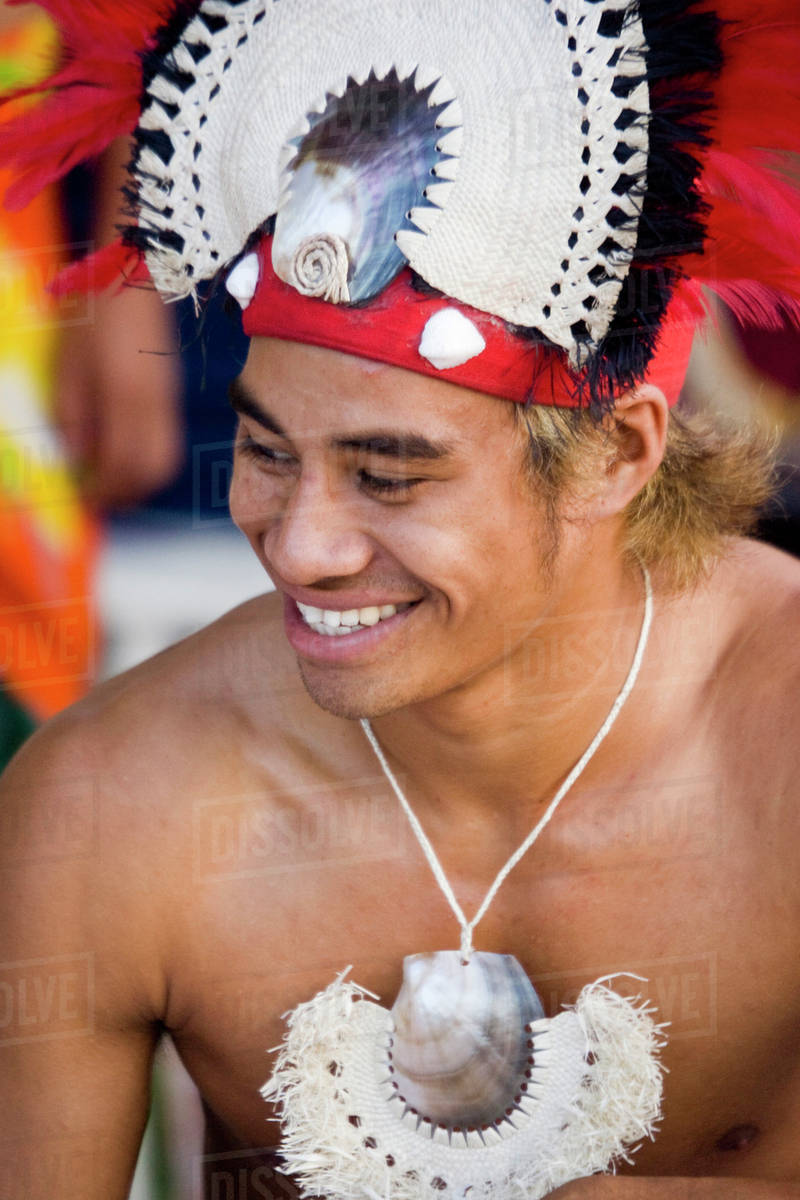 Polynesia, Cook Islands, Rarotonga. Male dancer in traditional native ...