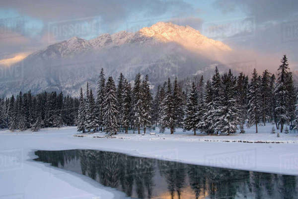 Canada, Banff, View of Mt. Edith and Sawback Range with reflection in ...
