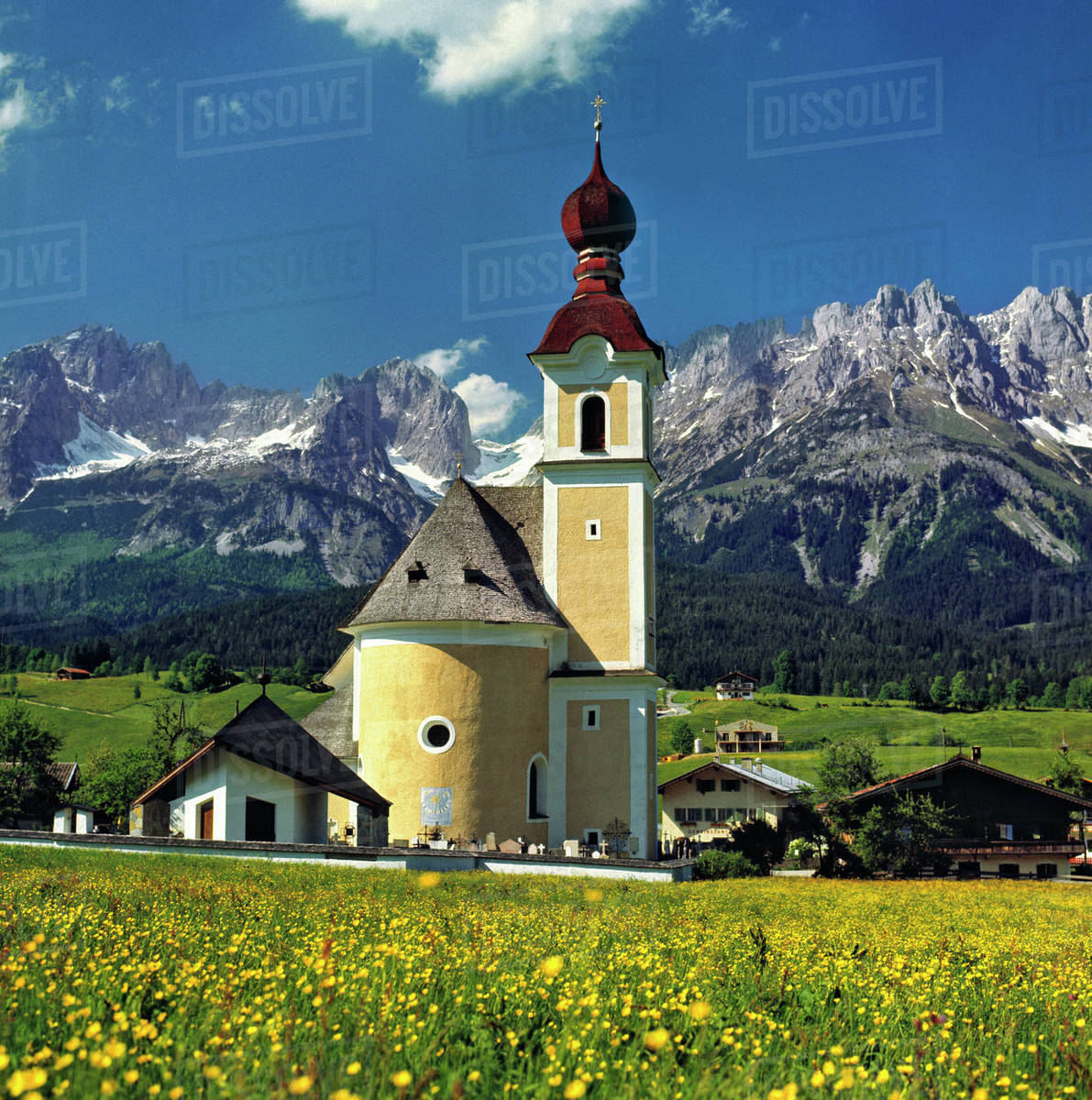 Europe, Austria, Inn River Valley. The charming church at Going in the ...