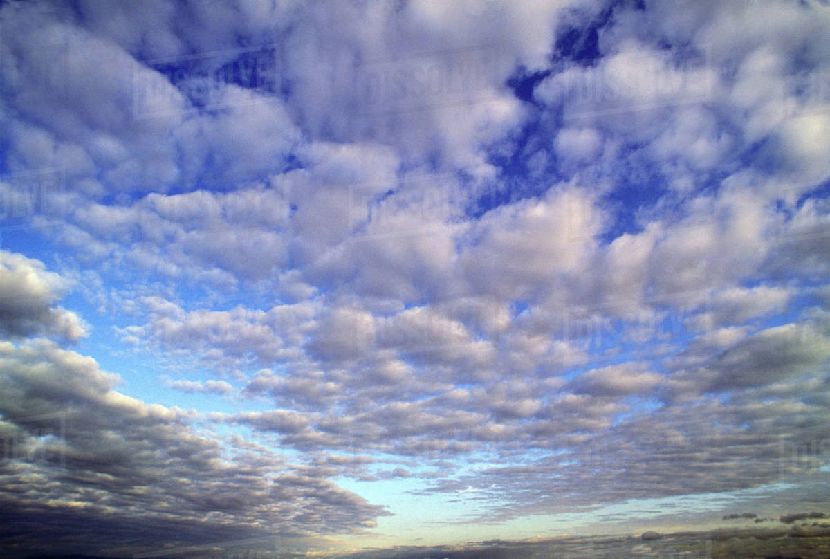 The storm clouds break up to reveal the blue early morning sky above ...
