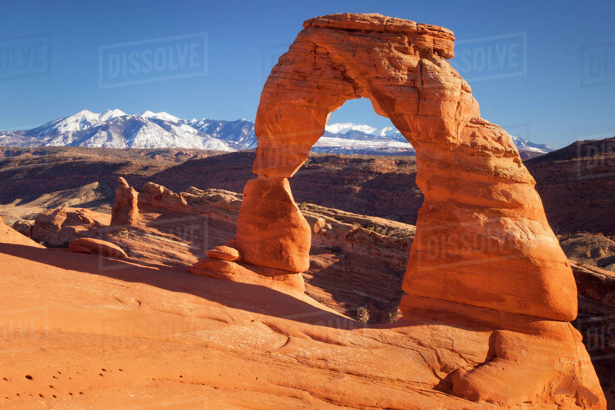 Delicate Arch with the LaSalle Mountains beyond, Arches National Park ...