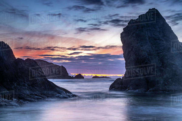 USA, Oregon, Bandon Beach. Pacific Ocean sea stacks at sunset. - Stock ...