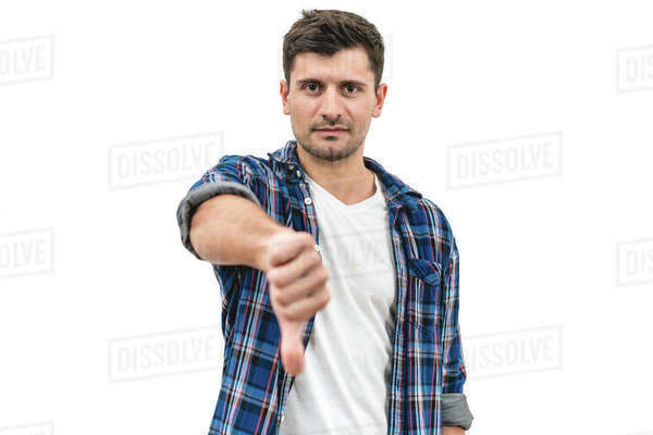 The man thumbs down on the white background - Stock Photo - Dissolve