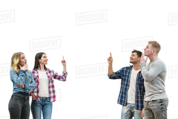The four people stand and gesture on the white wall background - Stock ...