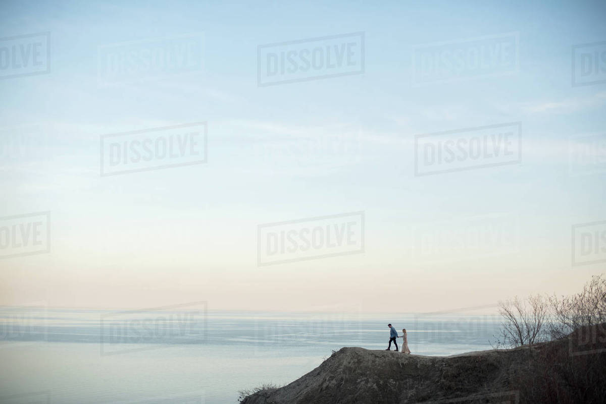 Couple enjoying view on cliff, Ottawa, Ontario - Royalty-free Stock ...