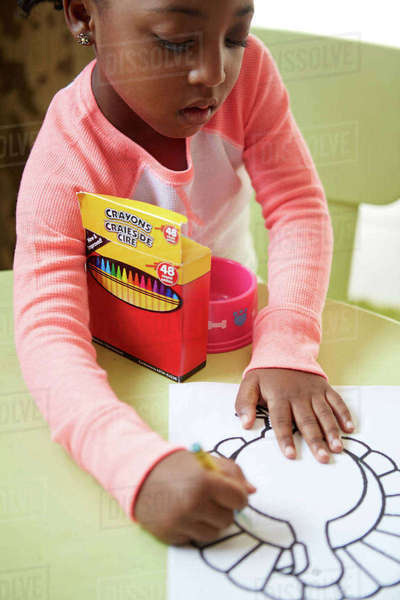 Young girl enjoying colouring in activity - Royalty-free Stock Photo ...