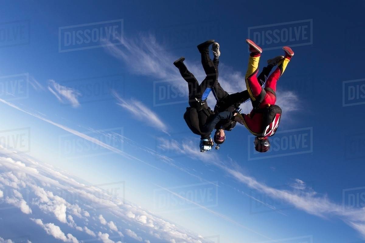 Formation skydivers free falling upside down - Royalty-free Stock Photo ...