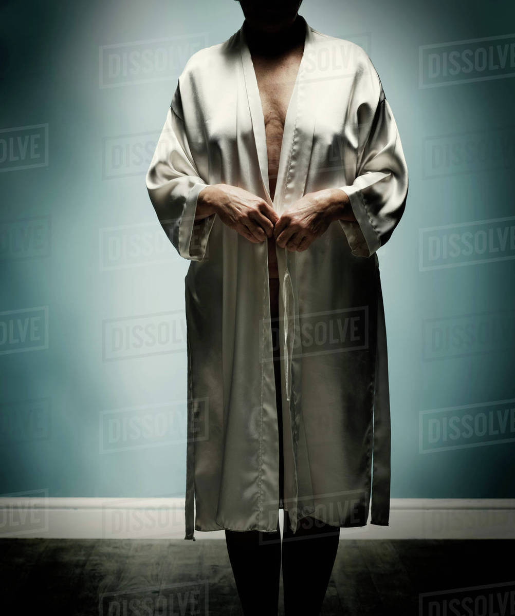 Older woman wearing open bathrobe - Royalty-free Stock Photo | Dissolve