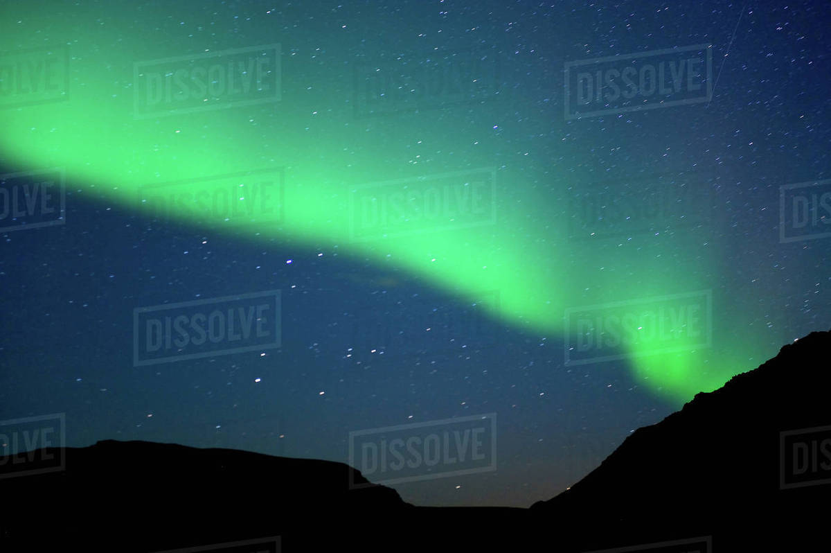 Northern lights in night sky - Royalty-free Stock Photo | Dissolve