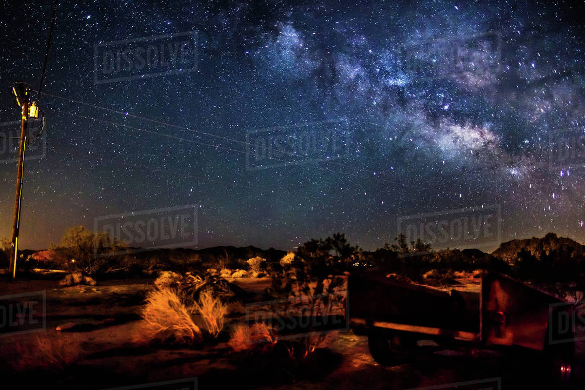 Illuminated night sky over rural landscape - Royalty-free Stock Photo ...