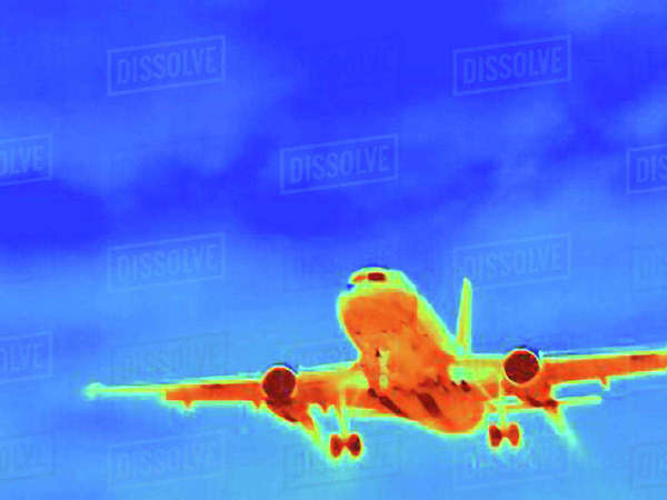 Thermal image of airplane in sky - Royalty-free Stock Photo | Dissolve