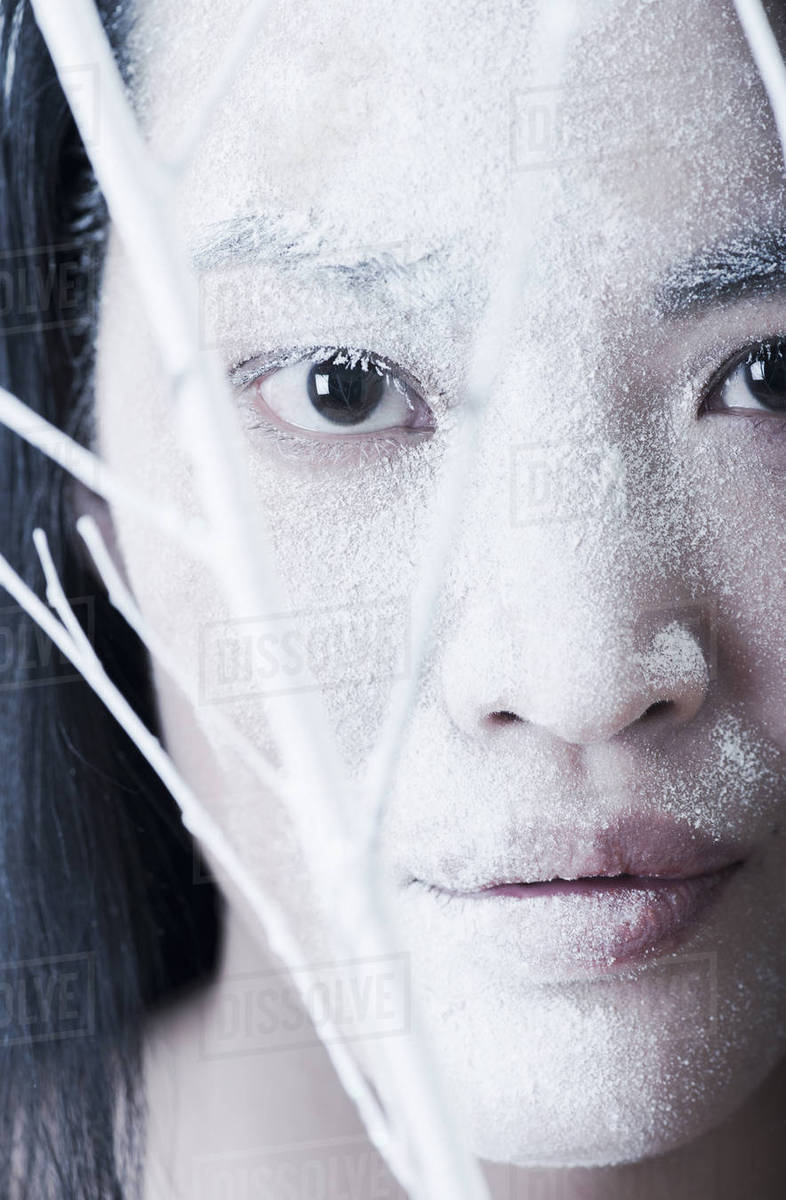 Woman's face covered in powder - Royalty-free Stock Photo | Dissolve