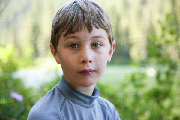 Boy looking at camera - Royalty-free Stock Photo | Dissolve