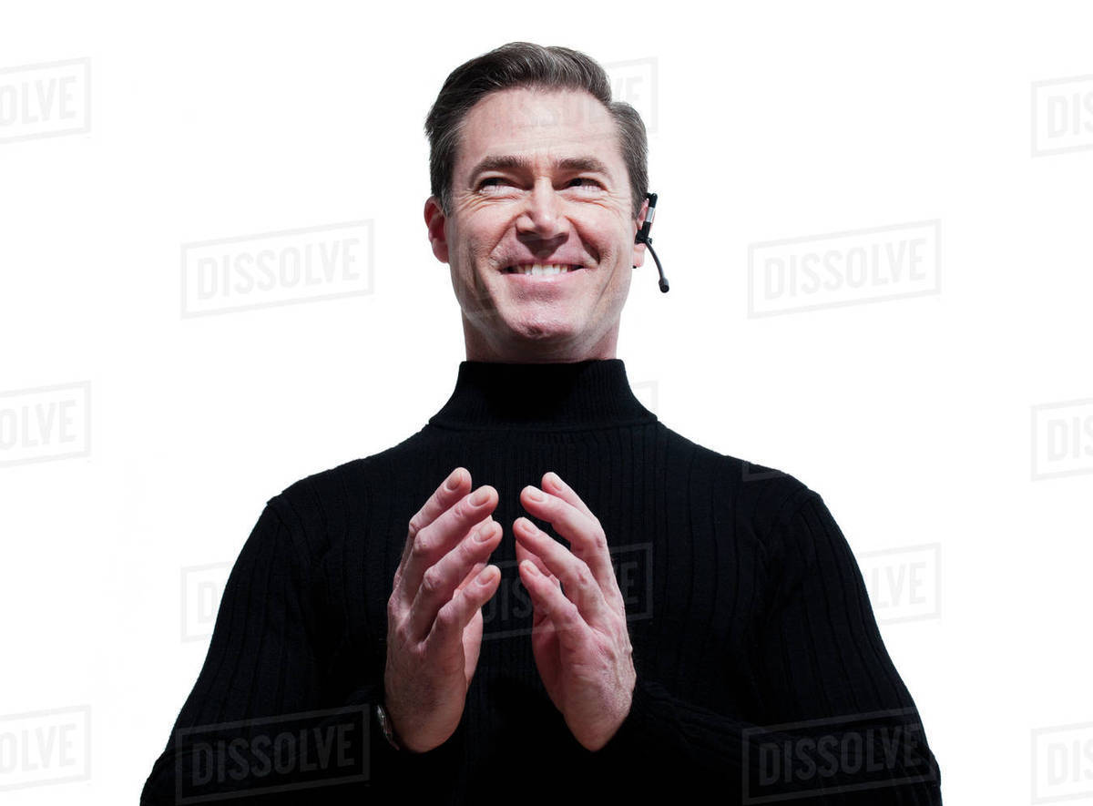 Smiling man wearing headset - Royalty-free Stock Photo | Dissolve
