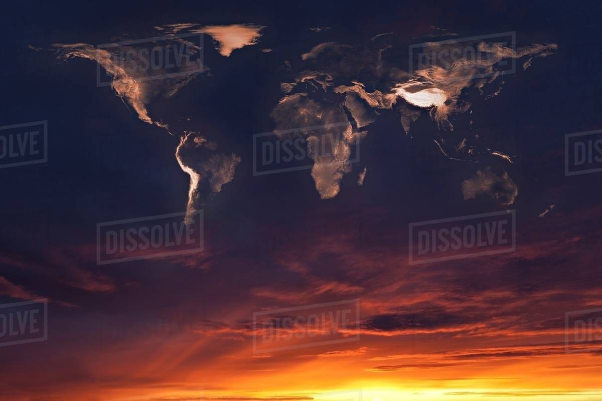 Map of the world in clouds at sunset - Stock Photo - Dissolve