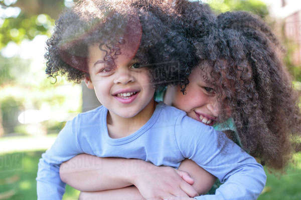 Portrait of two sisters, hugging, smiling - Royalty-free Stock Photo ...