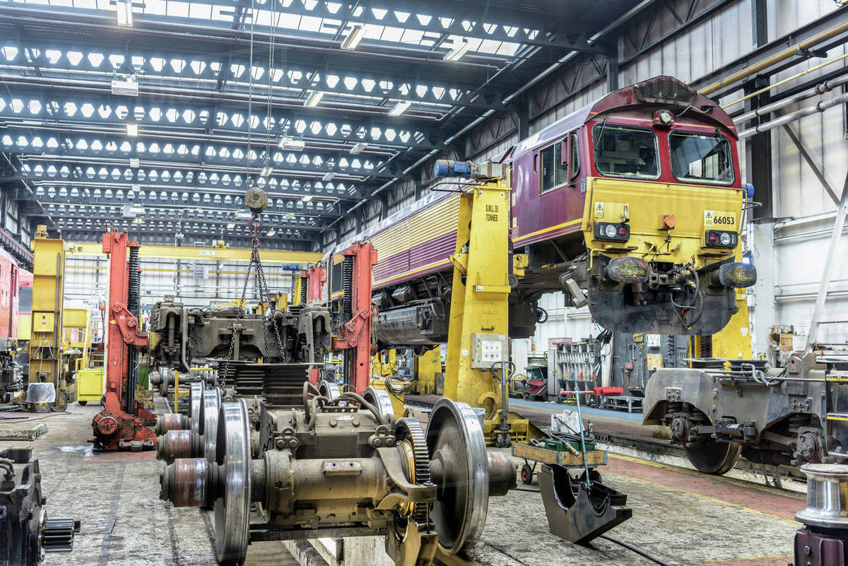 Locomotives in train works - Stock Photo - Dissolve