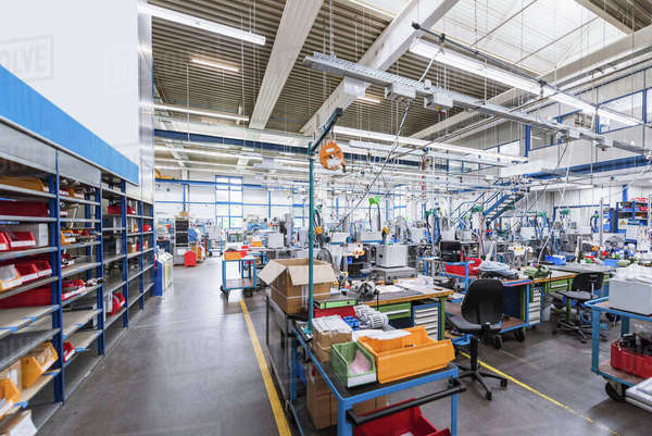 Empty factory production line and work stations - Stock Photo - Dissolve