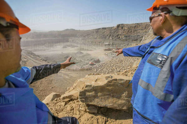 Two quarry worker in discussion at quarry - Royalty-free Stock Photo ...