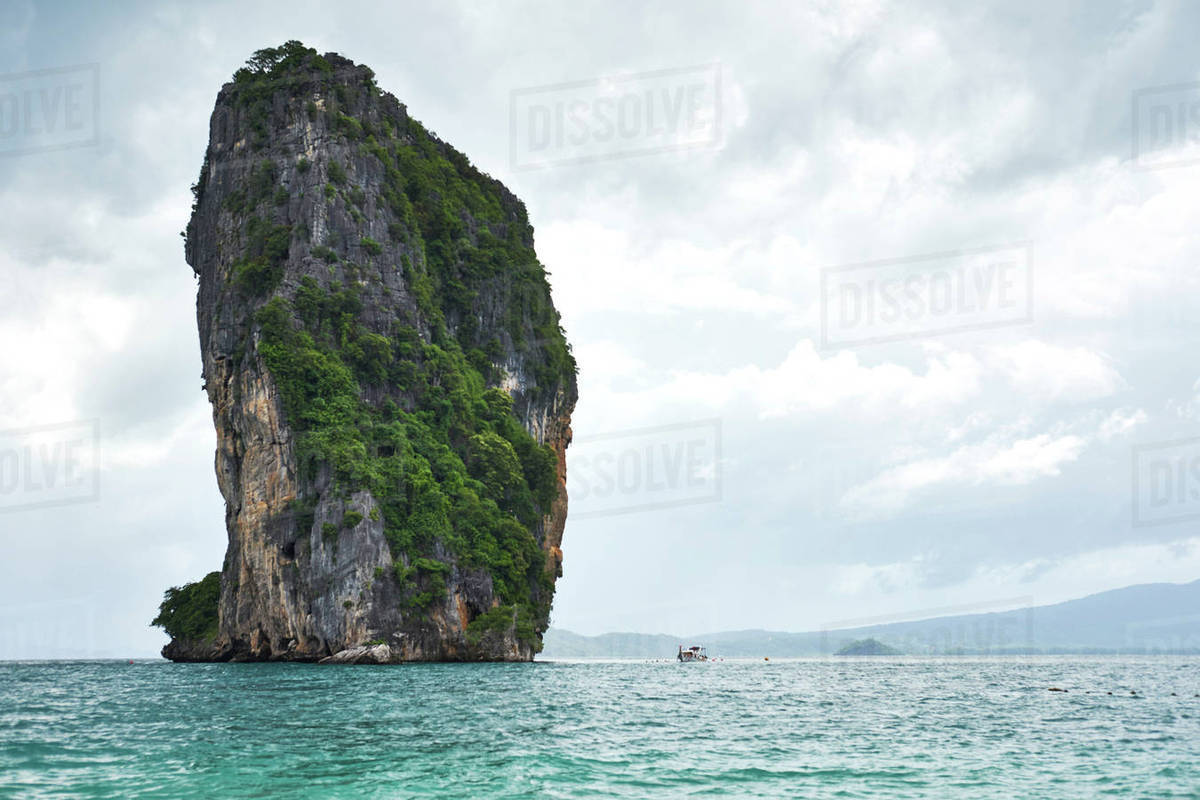 Rock formation protruding from sea, Phuket, Thailand, Asia - Royalty ...