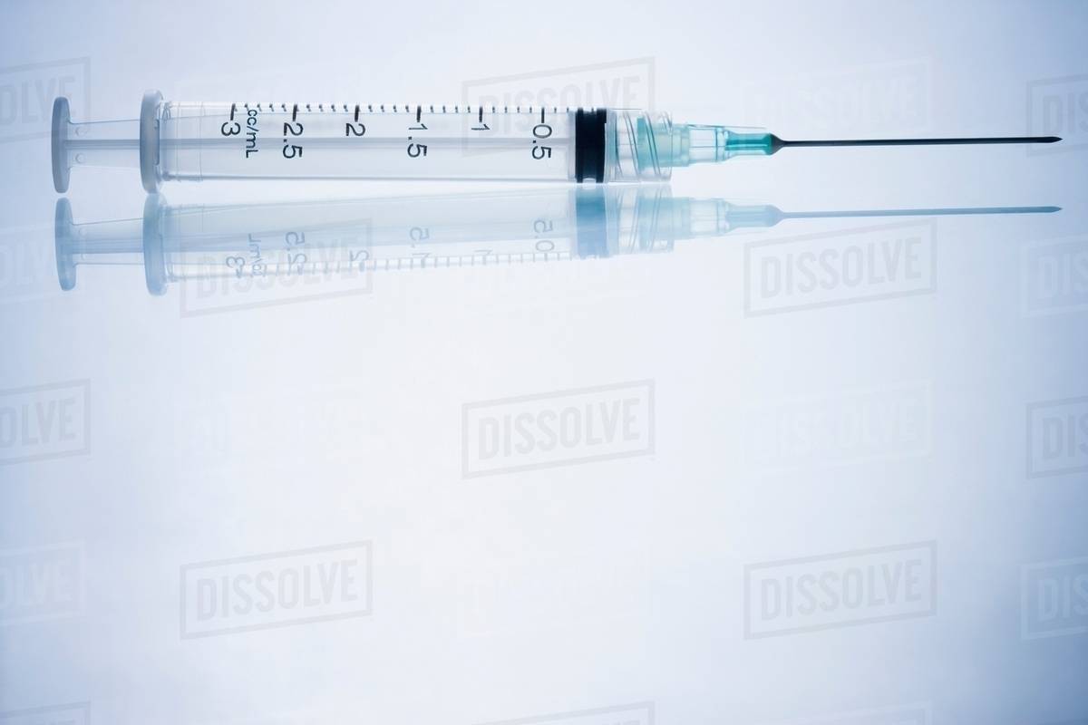 Empty syringe, side view - Royalty-free Stock Photo | Dissolve