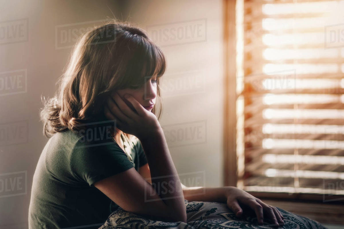Girl daydreaming - Royalty-free Stock Photo | Dissolve
