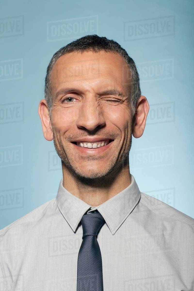 Man winking - Royalty-free Stock Photo | Dissolve