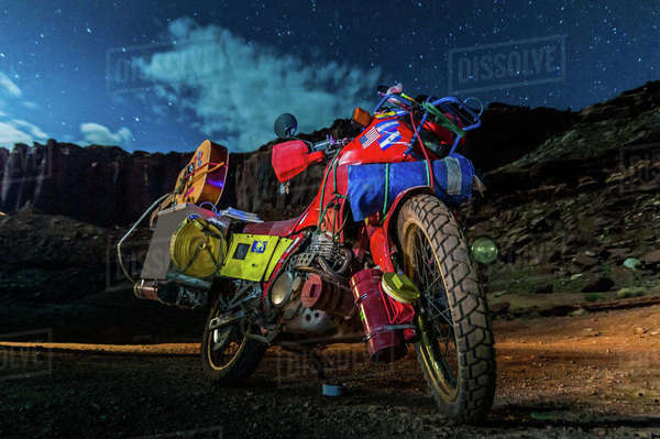 Motorcycle on rock climbing route, Canyonlands National Park, Moab ...