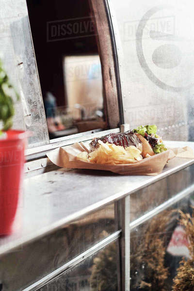 Food served through window of camper van food truck - Stock Photo ...