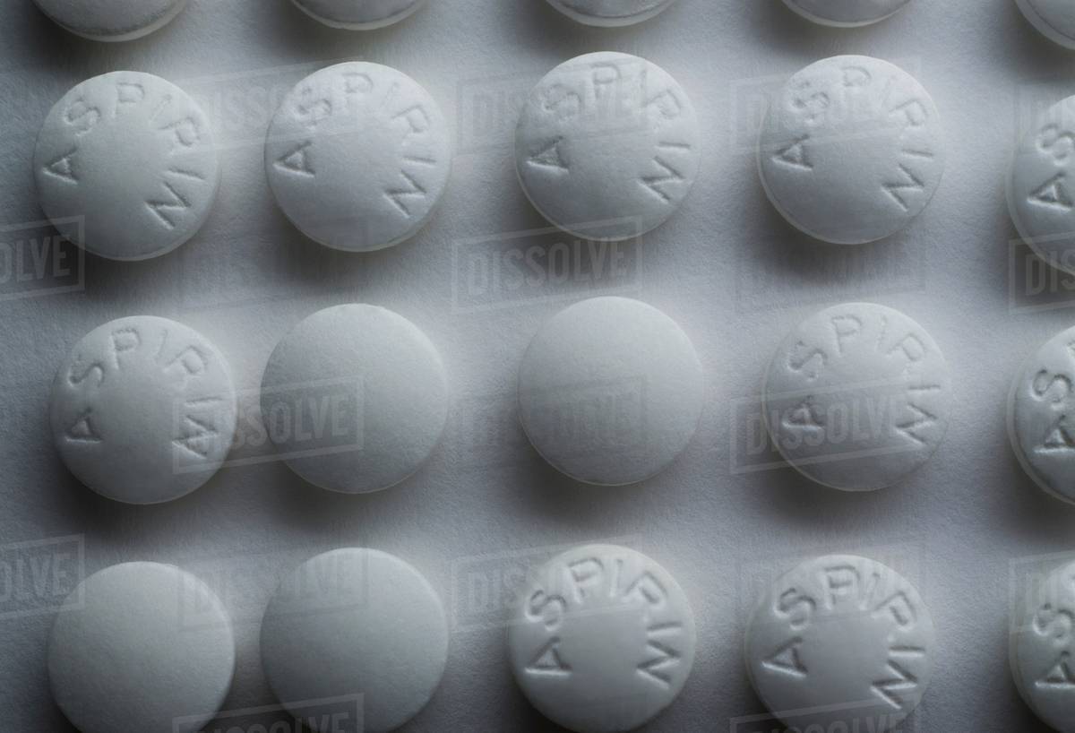 Aspirins in a row - Royalty-free Stock Photo | Dissolve