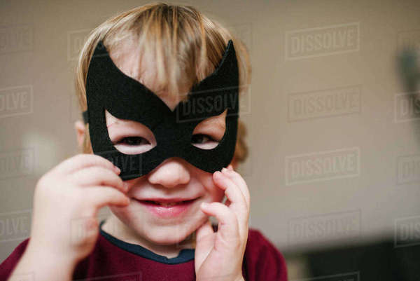 Boy in costume mask - Stock Photo - Dissolve