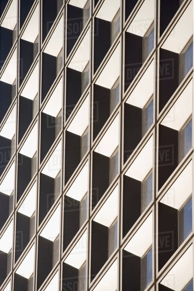 Tilted view of skyscraper windows - Royalty-free Stock Photo | Dissolve