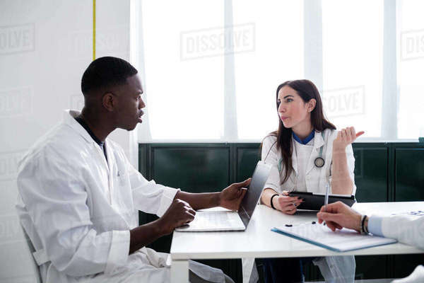 Doctors having discussion in meeting room - Royalty-free Stock Photo ...