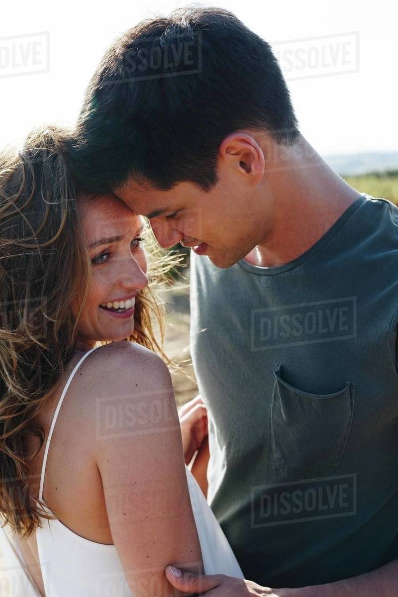 Romantic couple nuzzling - Royalty-free Stock Photo | Dissolve