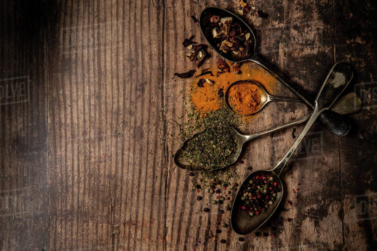 Spoons with variety of spices and condiments - Royalty-free Stock Photo ...