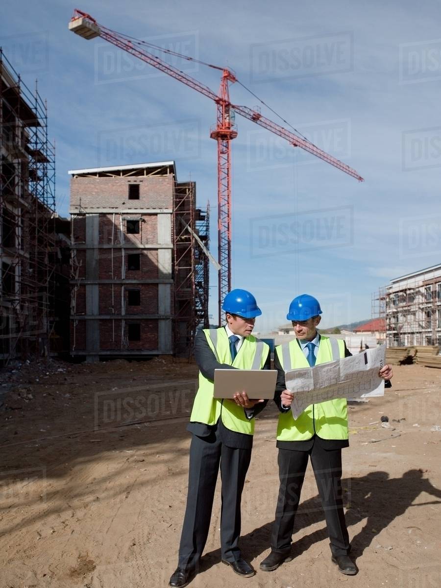 Engineers on building site - Stock Photo - Dissolve