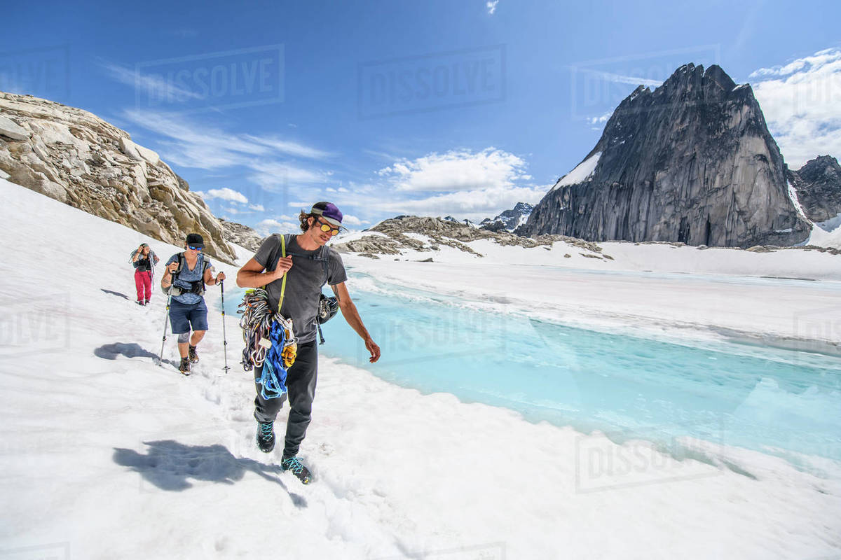 Climbers walking in Bugaboo Provincial Park, British Columbia, Canada ...