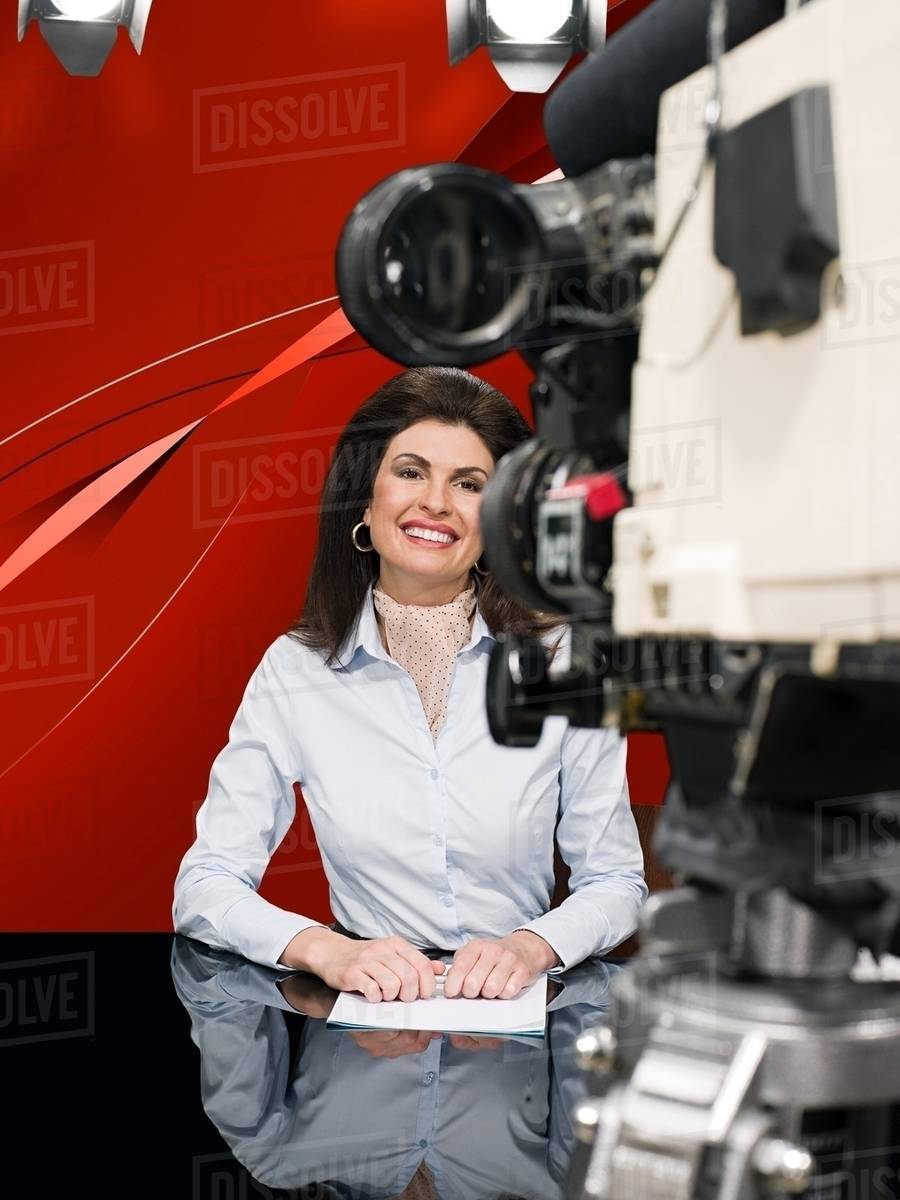 News presenter and camera - Royalty-free Stock Photo | Dissolve