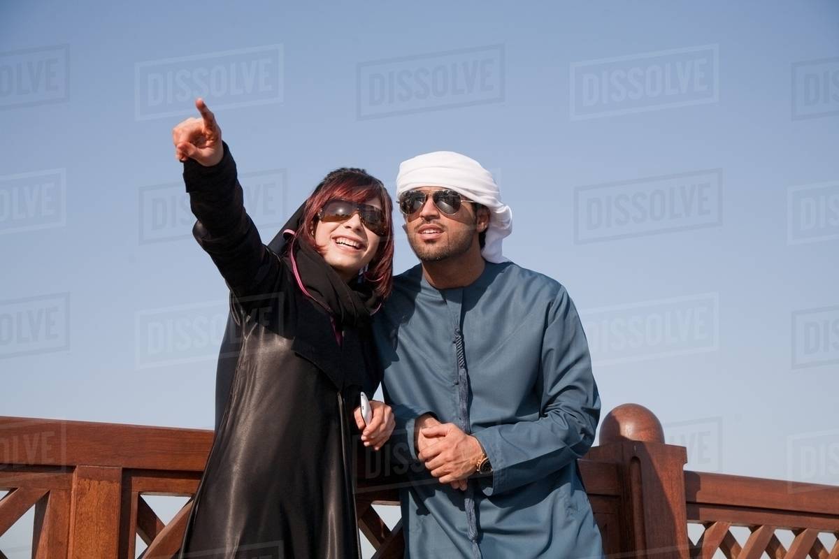 Middle Eastern people and fence, outdoors - Royalty-free Stock Photo ...