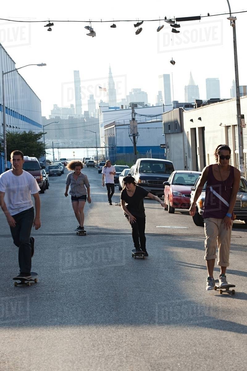 Skateboarders on urban street - Royalty-free Stock Photo | Dissolve