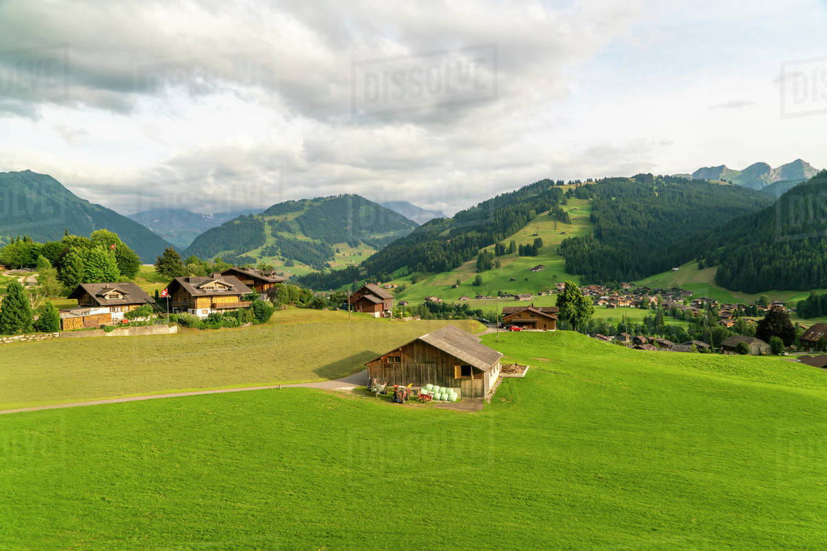 Switzerland, Interlaken, Farms and fields in rural landscape - Royalty ...