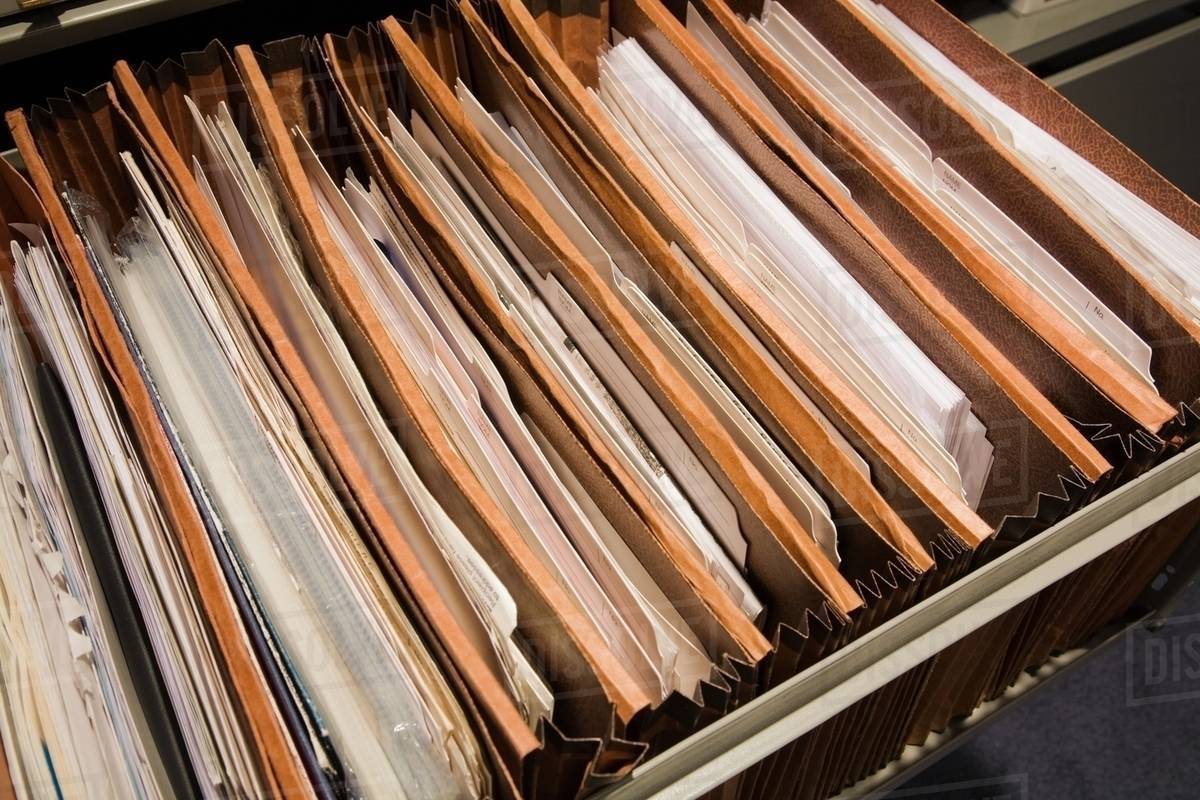 Files in a drawer - Stock Photo - Dissolve