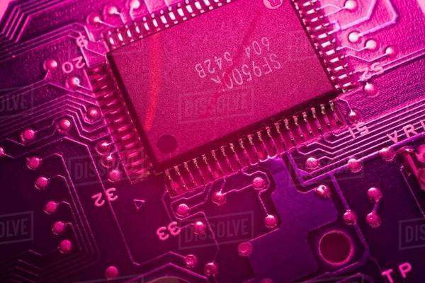 Pink circuit board - Stock Photo - Dissolve