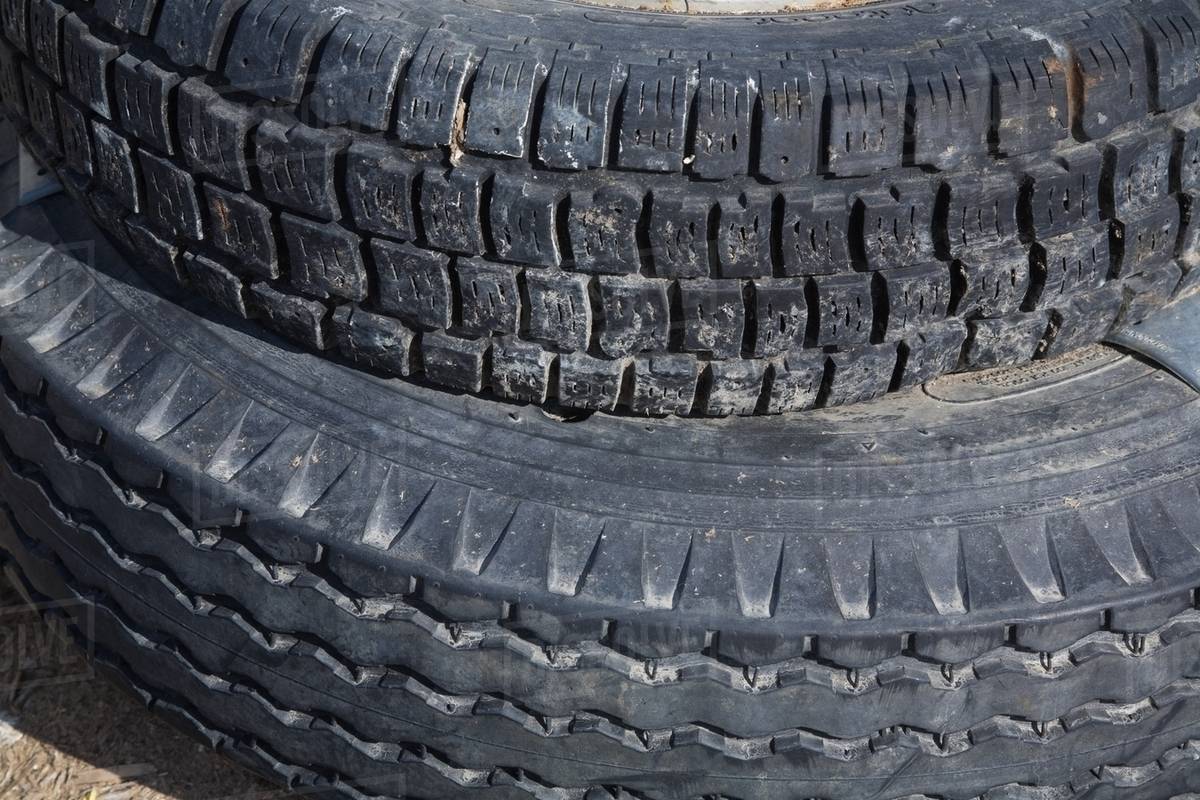 Two tires, close up - Stock Photo - Dissolve